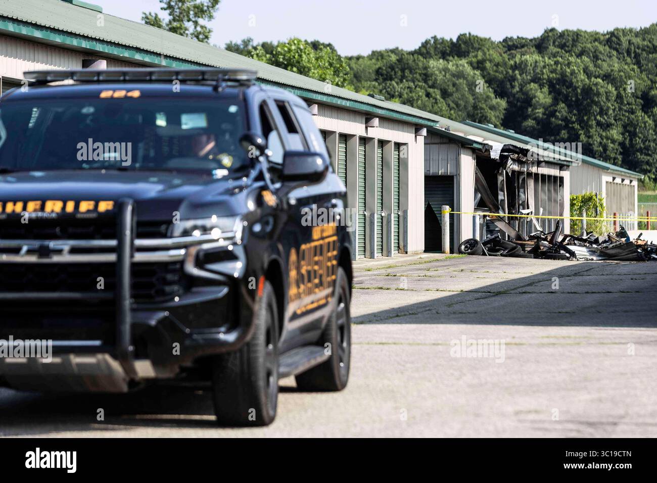 Wreckage from a deadly plane crash lies at Priceless Storage in Lowell ...