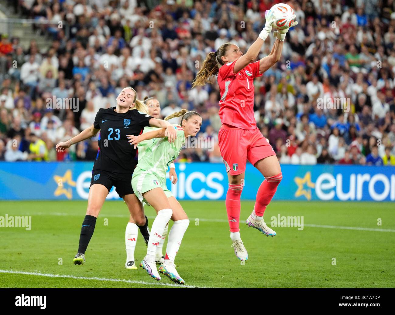 Italy goalkeeper Laura Giuliani (right) claims the ball as England's ...