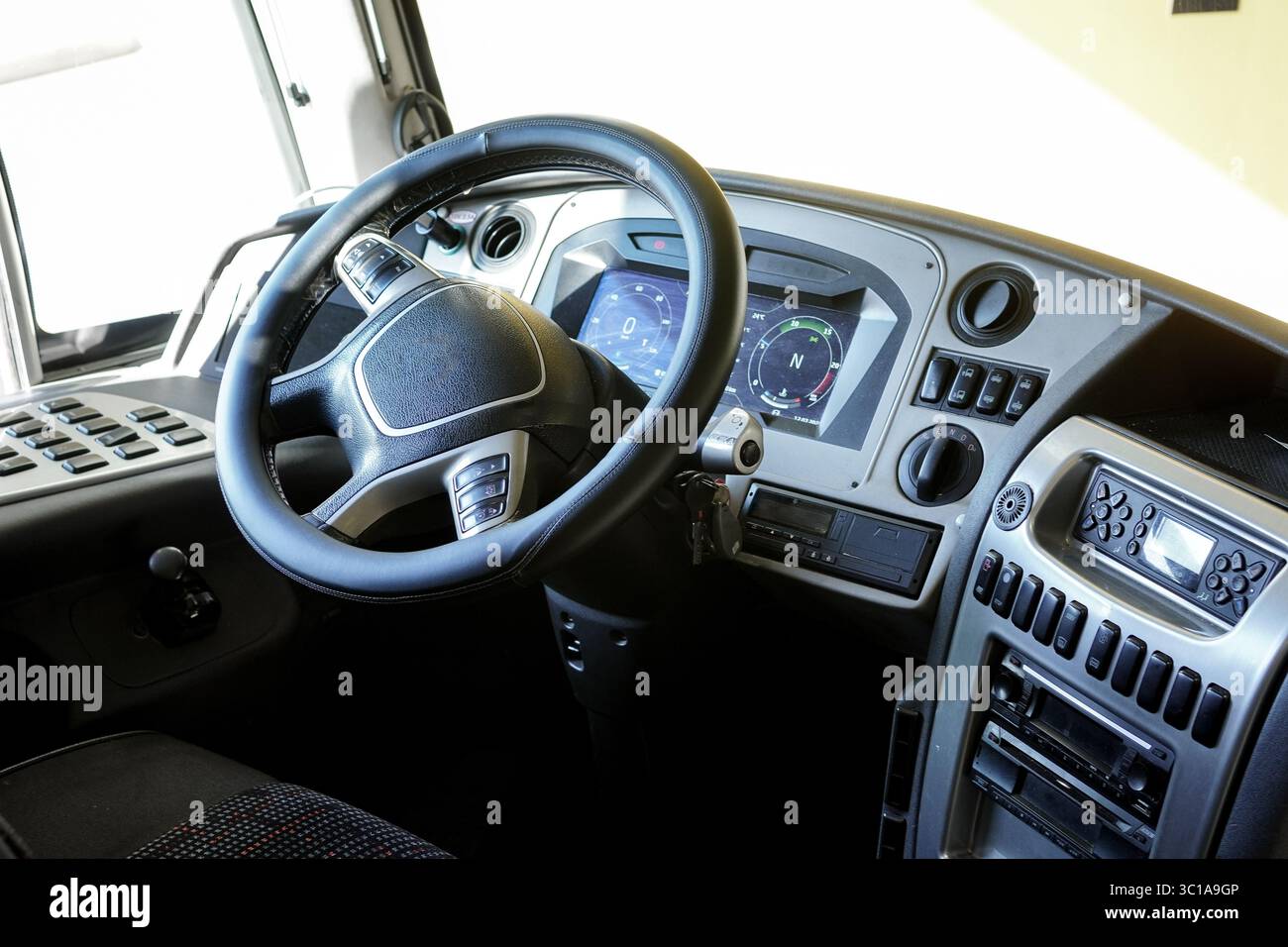 Driver's seat of the shuttle bus Stock Photo - Alamy