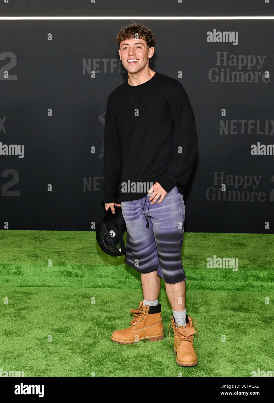 Ethan Cutkosky attends the premiere of Netflix's "Happy Gilmore 2" at ...