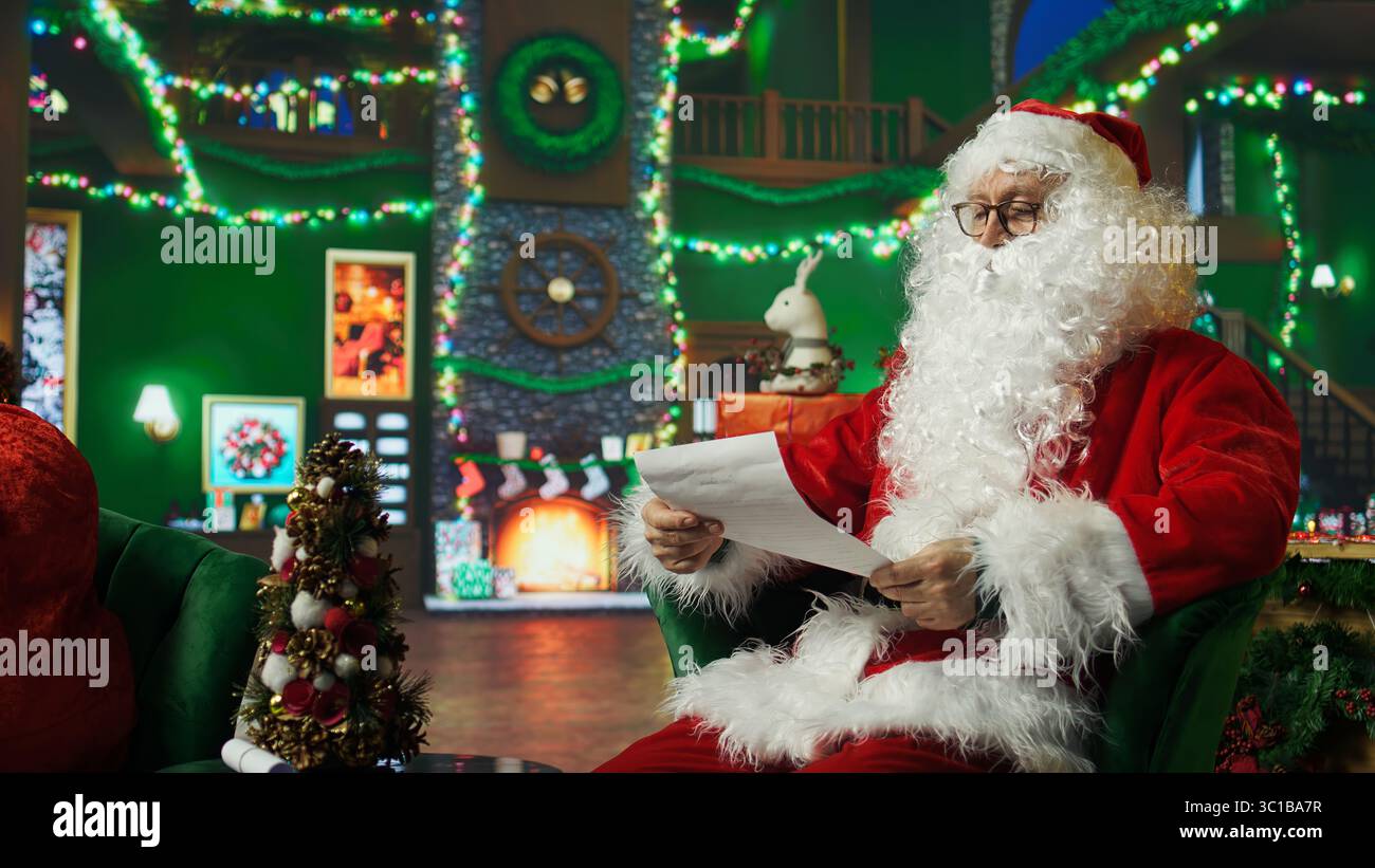 Portrait of man dressed as Santa Claus responding to kids letters about ...