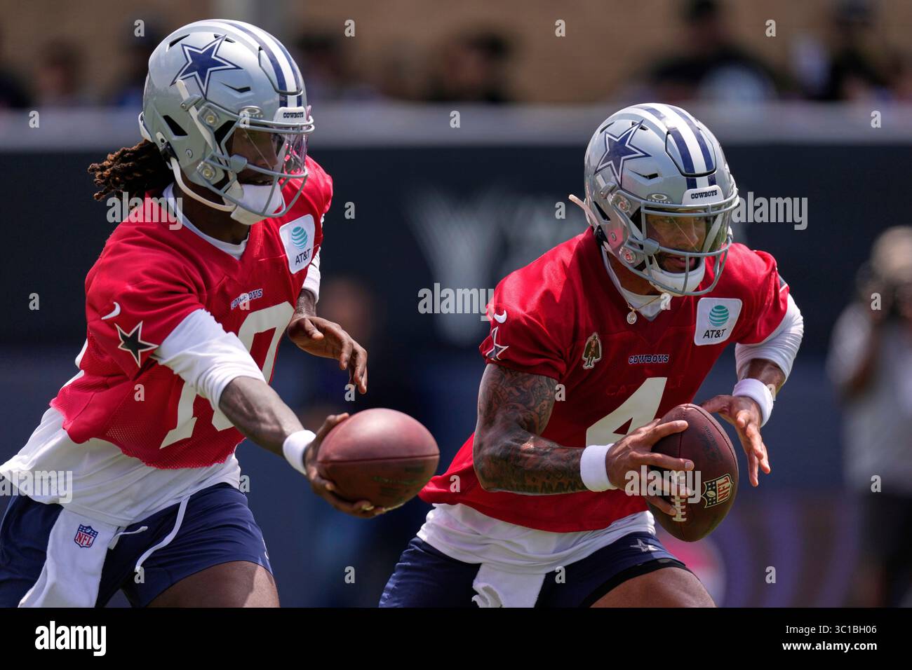 Dallas Cowboys quarterback Joe Milton III, left, and quarterback Dak ...
