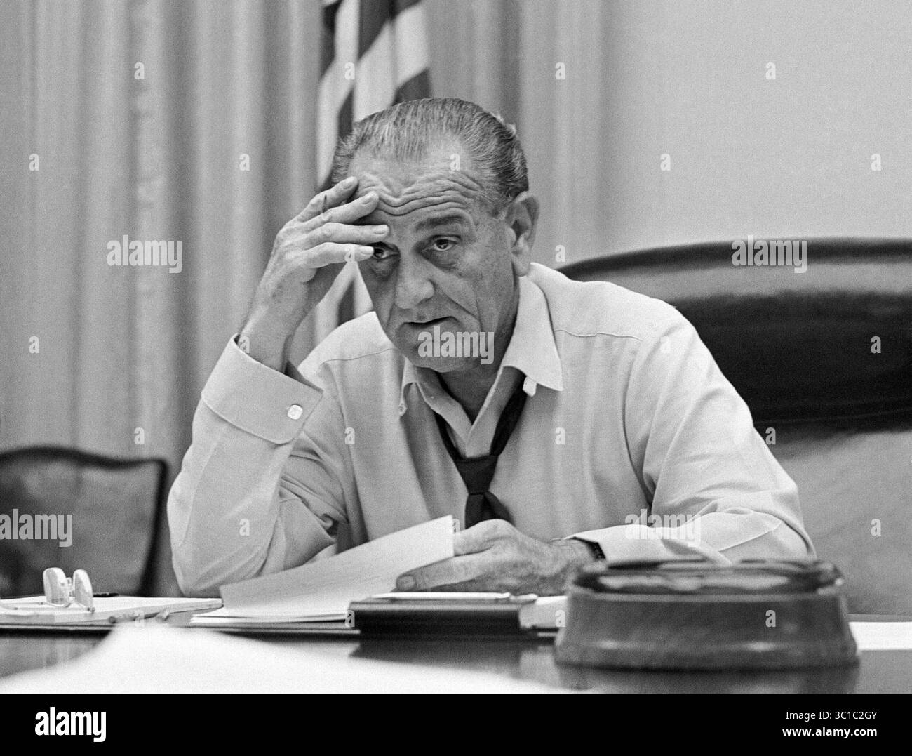 FILE - President Lyndon Johnson works on his speech in the White House ...
