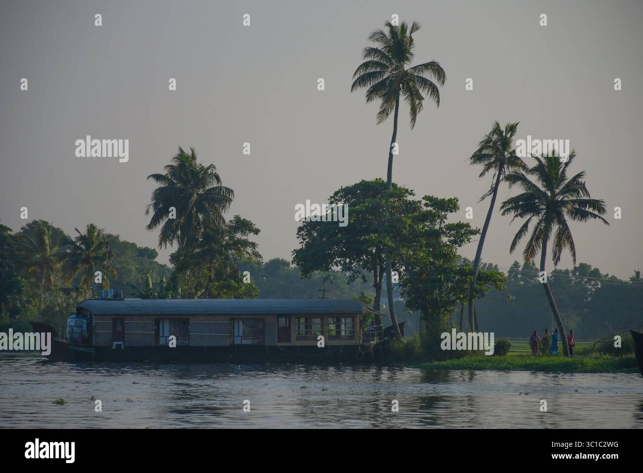 Houseboat in Kerala backwater sailing through the canals in Alleppey ...