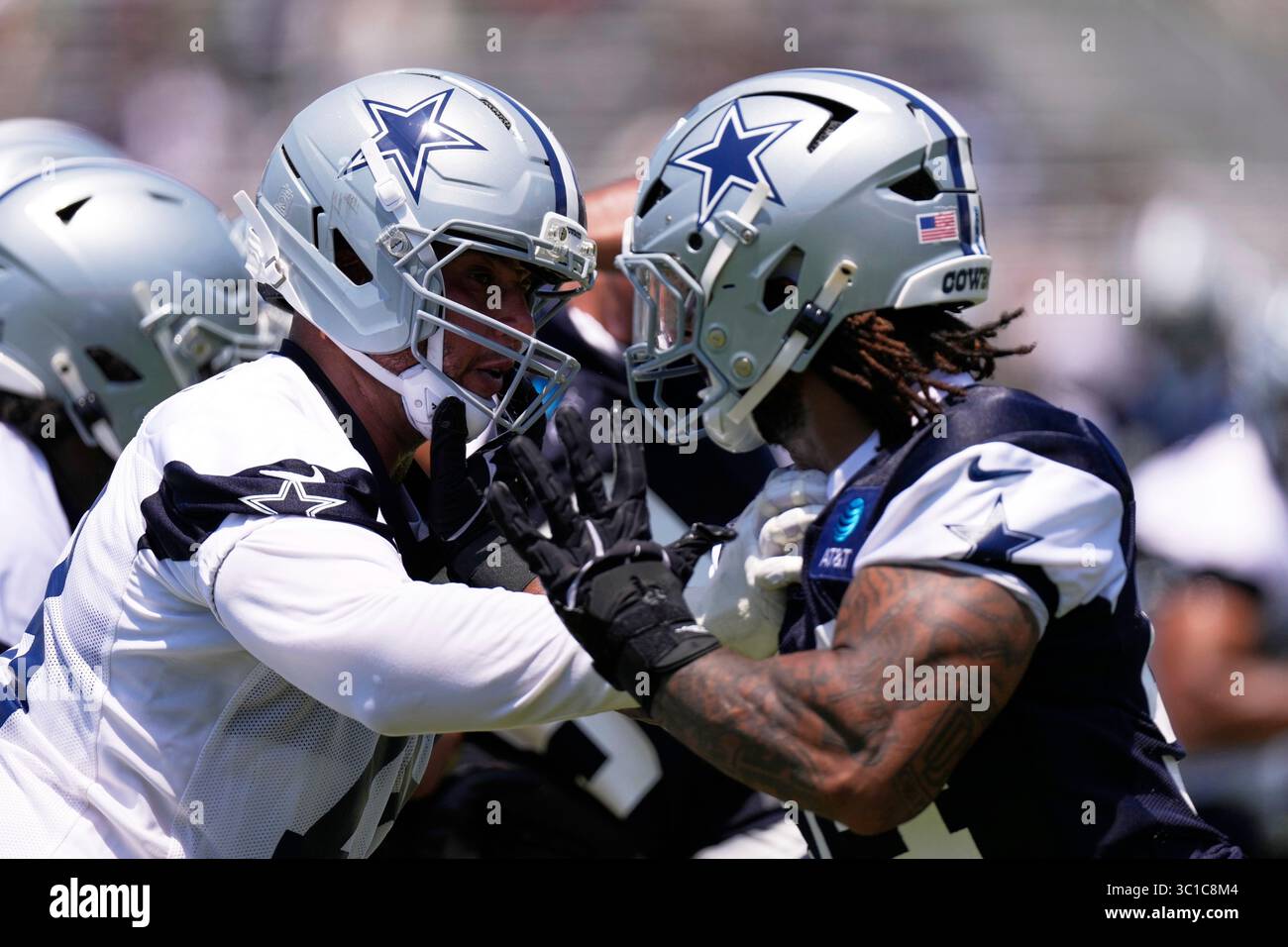 Dallas Cowboys offensive tackle Terence Steele, left, and defensive end ...