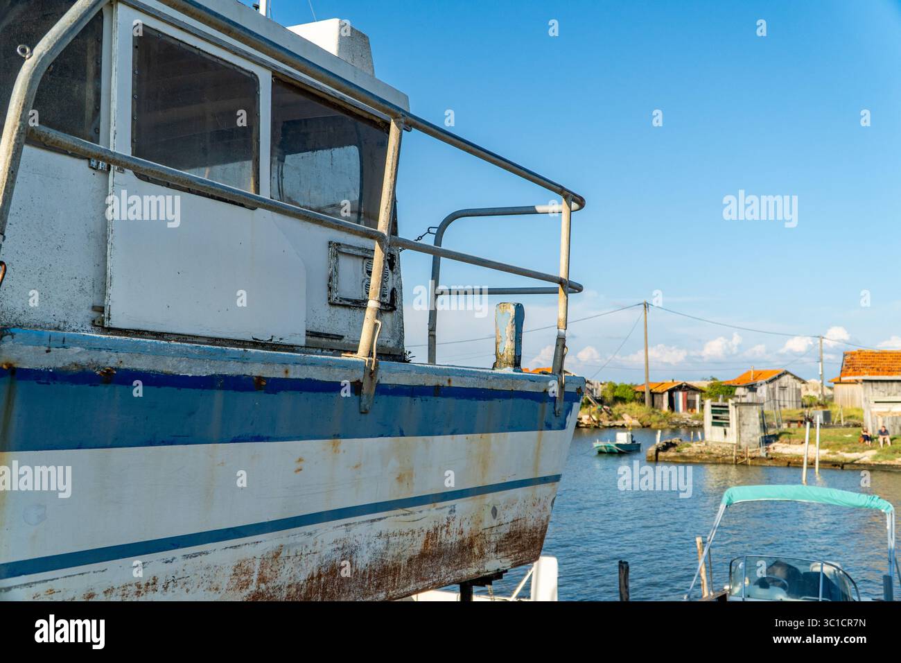 Oyster farming boat docked at low tide in Arcachon Bay, France Stock ...