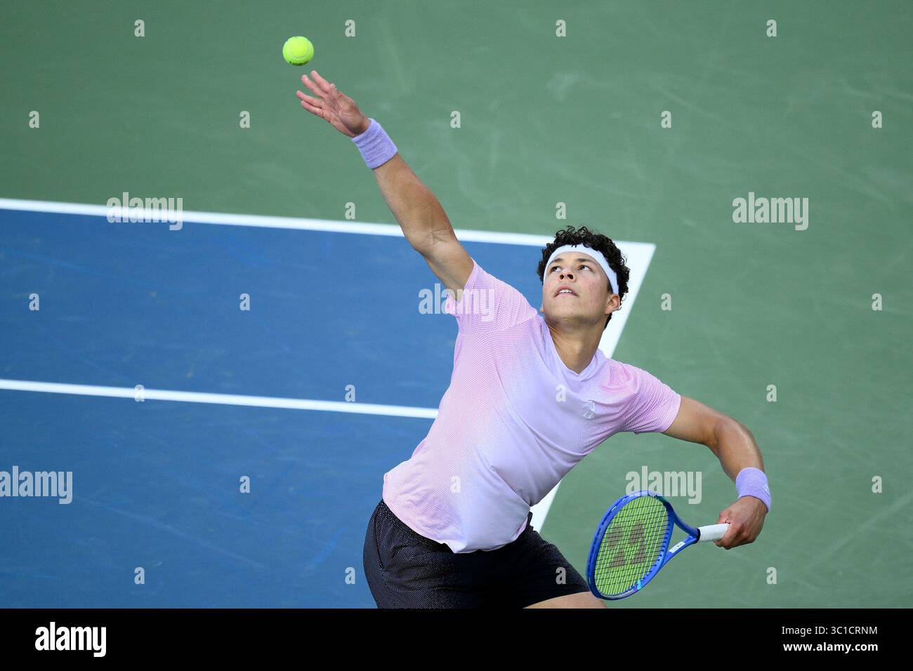 Ben Shelton serves against Mackenzie McDonald during a match at the ...