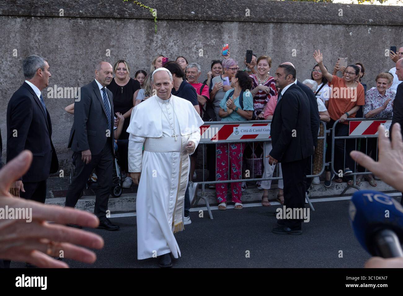 Pope Leo XIV greets the faithful as he leaves Villa Barberini, the ...