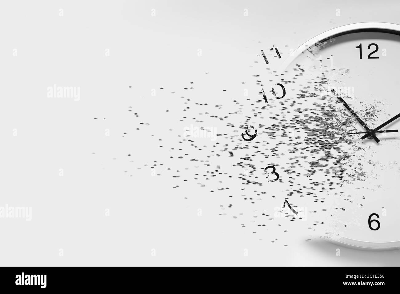 Time running out. Clock dissolving on white background Stock Photo - Alamy