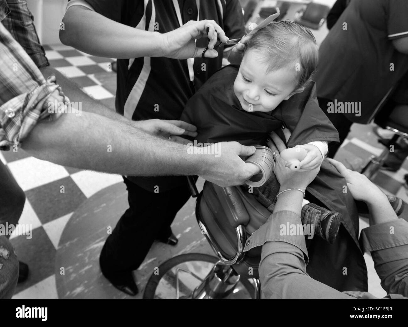 Hair cutting time Black and White Stock Photos & Images - Alamy