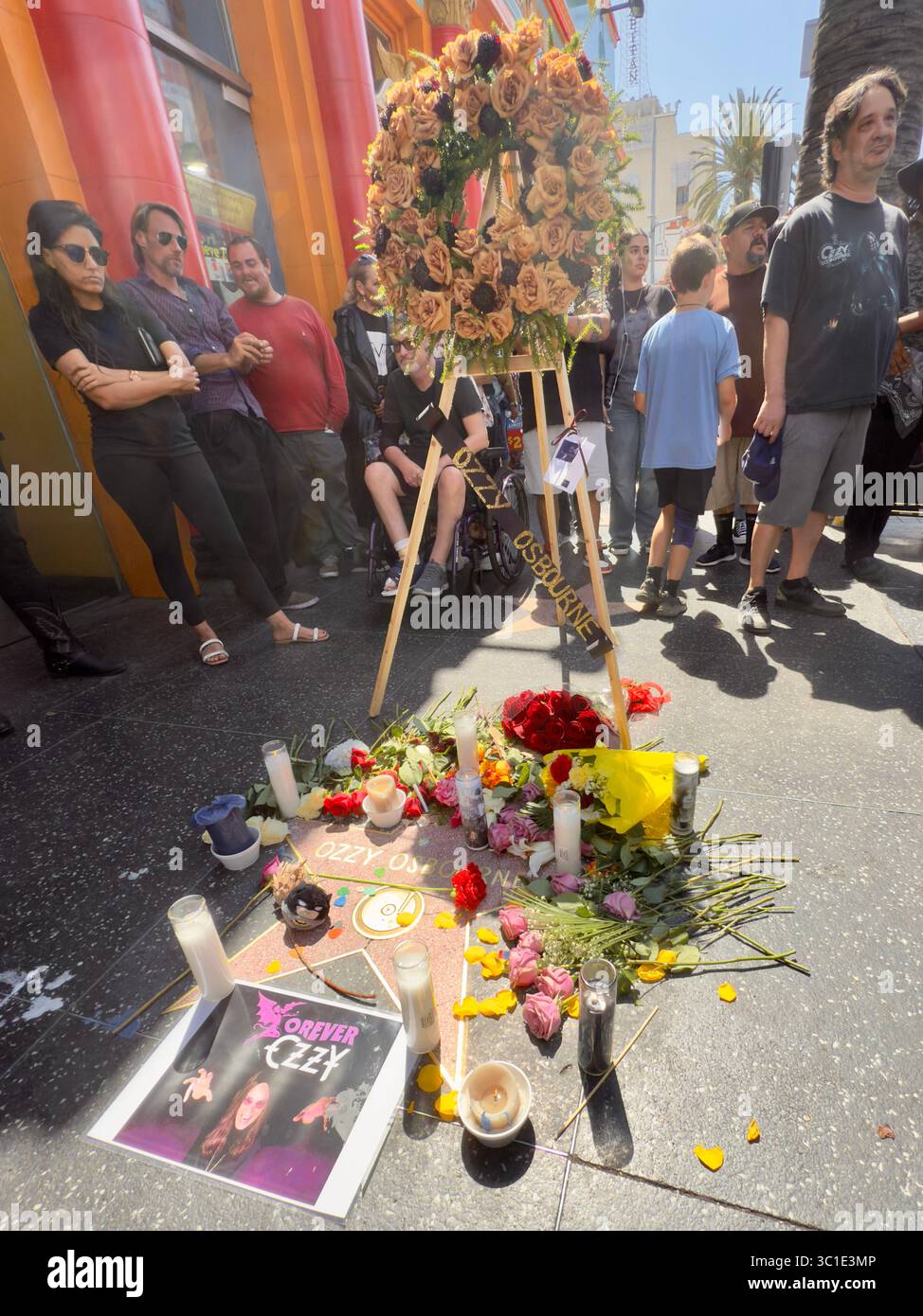 22nd July, 2025. Flowers, candles, and personal tributes are seen ...