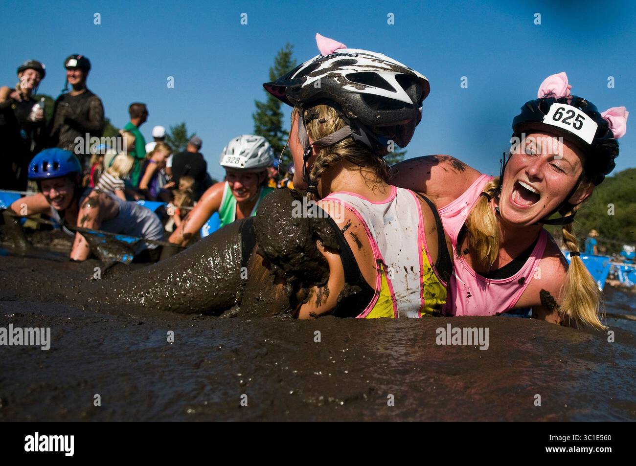 Team running through obstacle course hi-res stock photography and ...