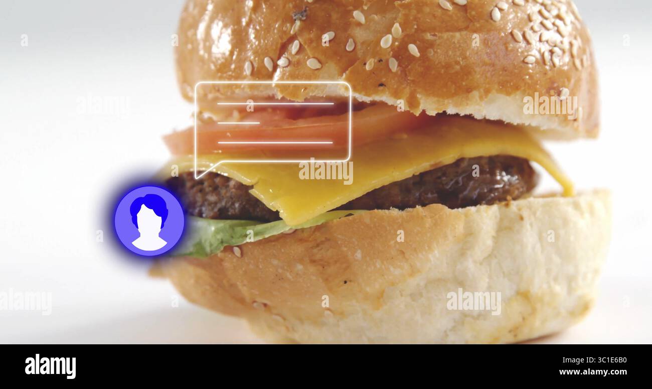Stacking sesame burger with cheddar, beef patty, lettuce, tomato in ...