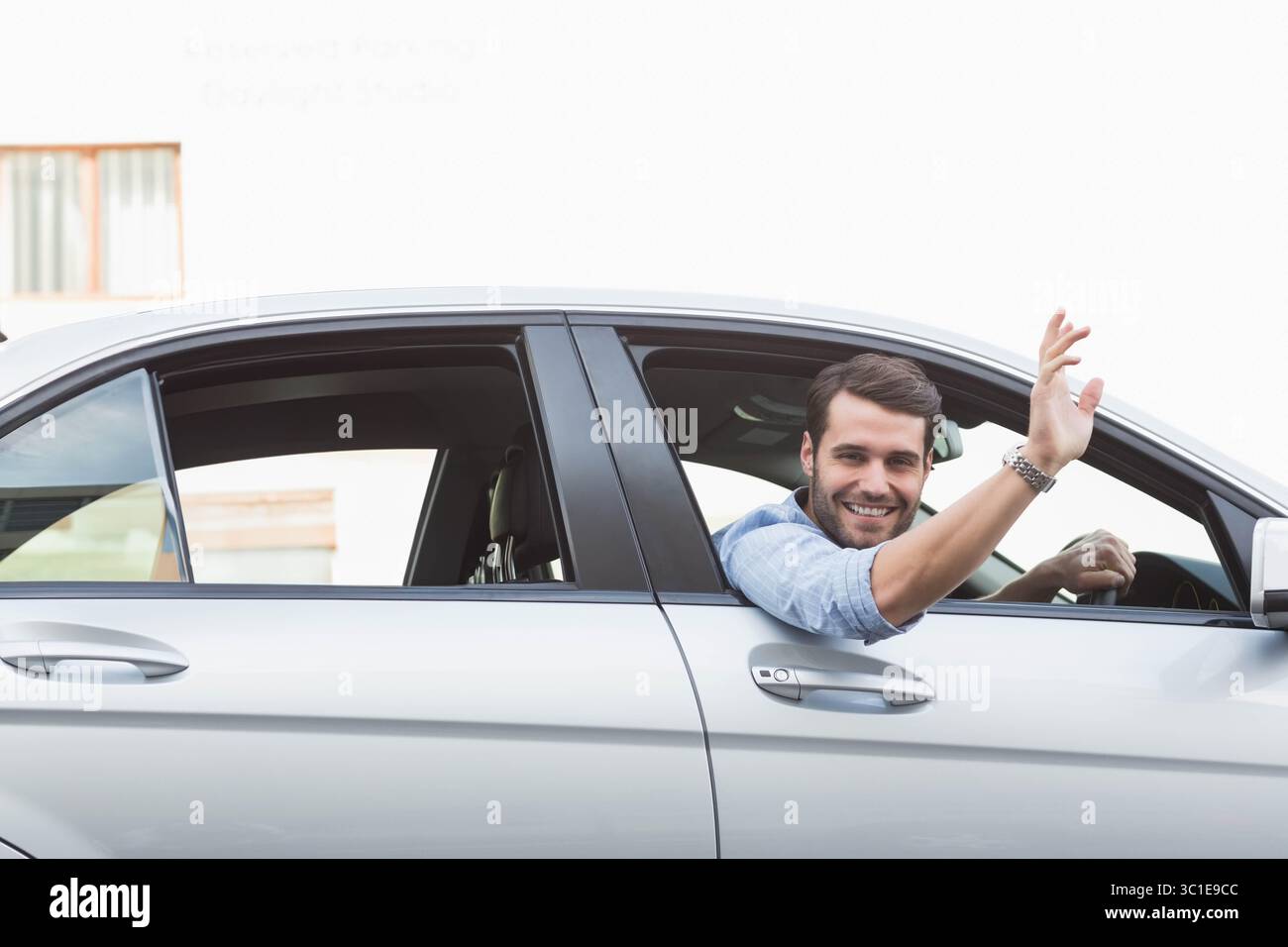 Hand out car windows waving hi-res stock photography and images - Alamy