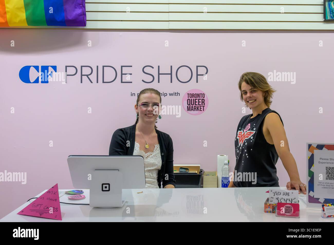 Two staff members smile hi-res stock photography and images - Alamy