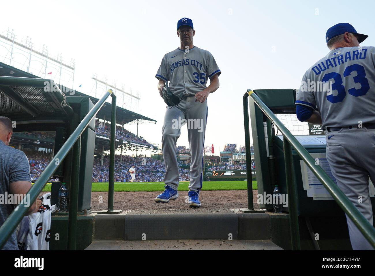 Kansas City Royals starting pitcher Rich Hill walks back to the dugout ...