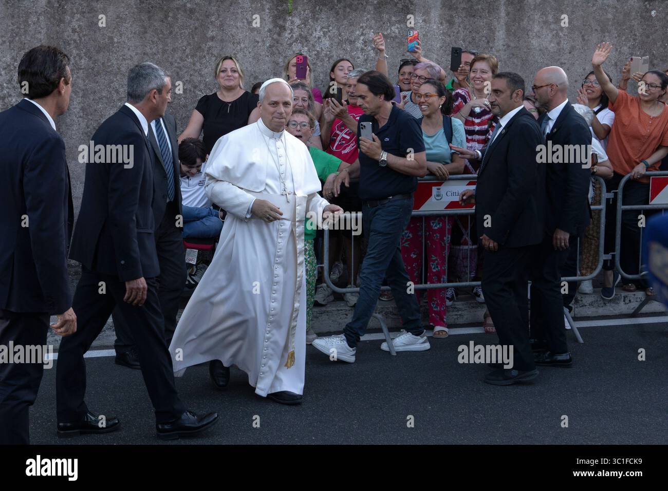 Pope Leo XIV greets the faithful as he leaves Villa Barberini, the ...