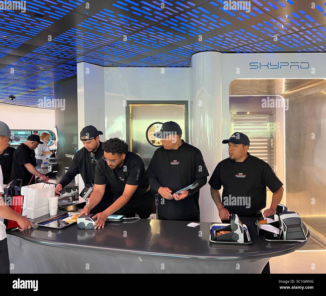 Los Angeles, USA.21th July 2025. Staff members pack food with ...