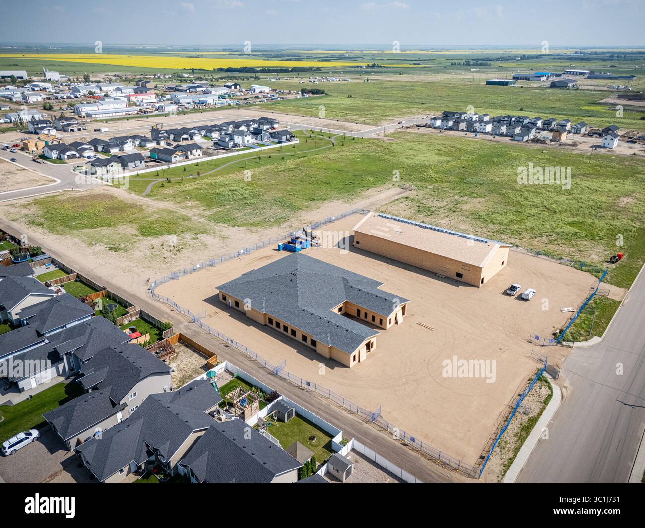 Residential area with a large building in the middle. The building is ...