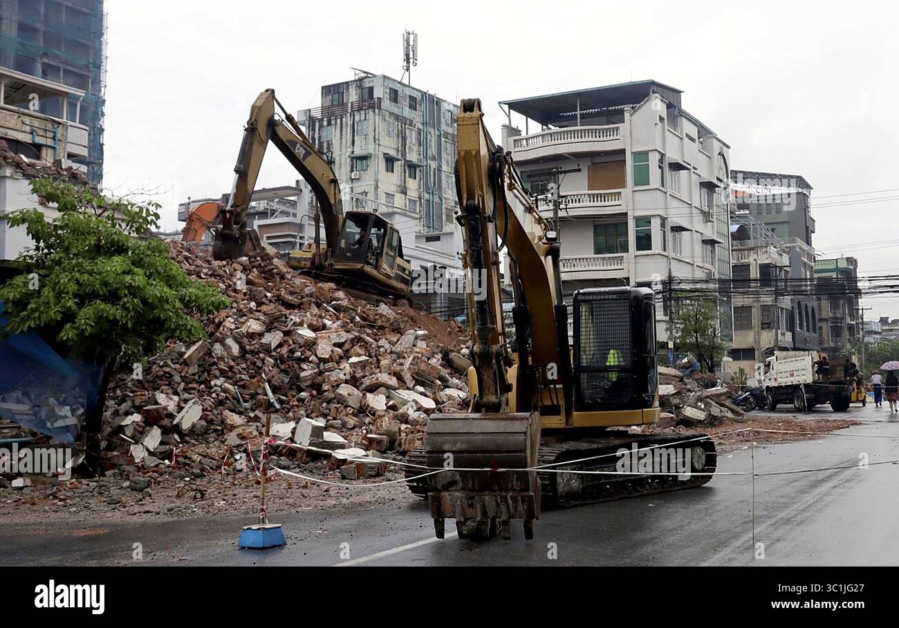 Demolition works continue at collapsed buildings in Mandalay, Myanmar ...