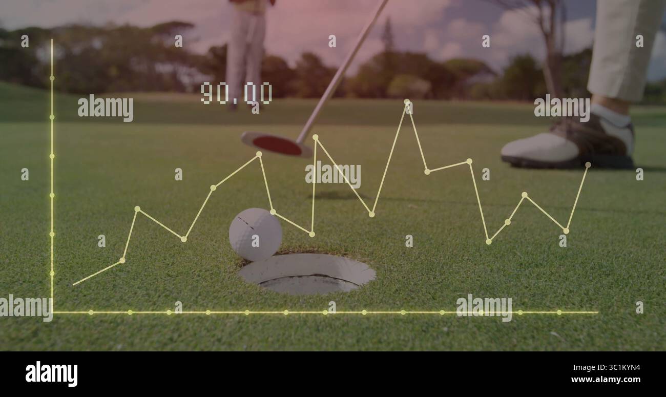 Balancing golf ball on hole edge at putting green, with putter, golf ...