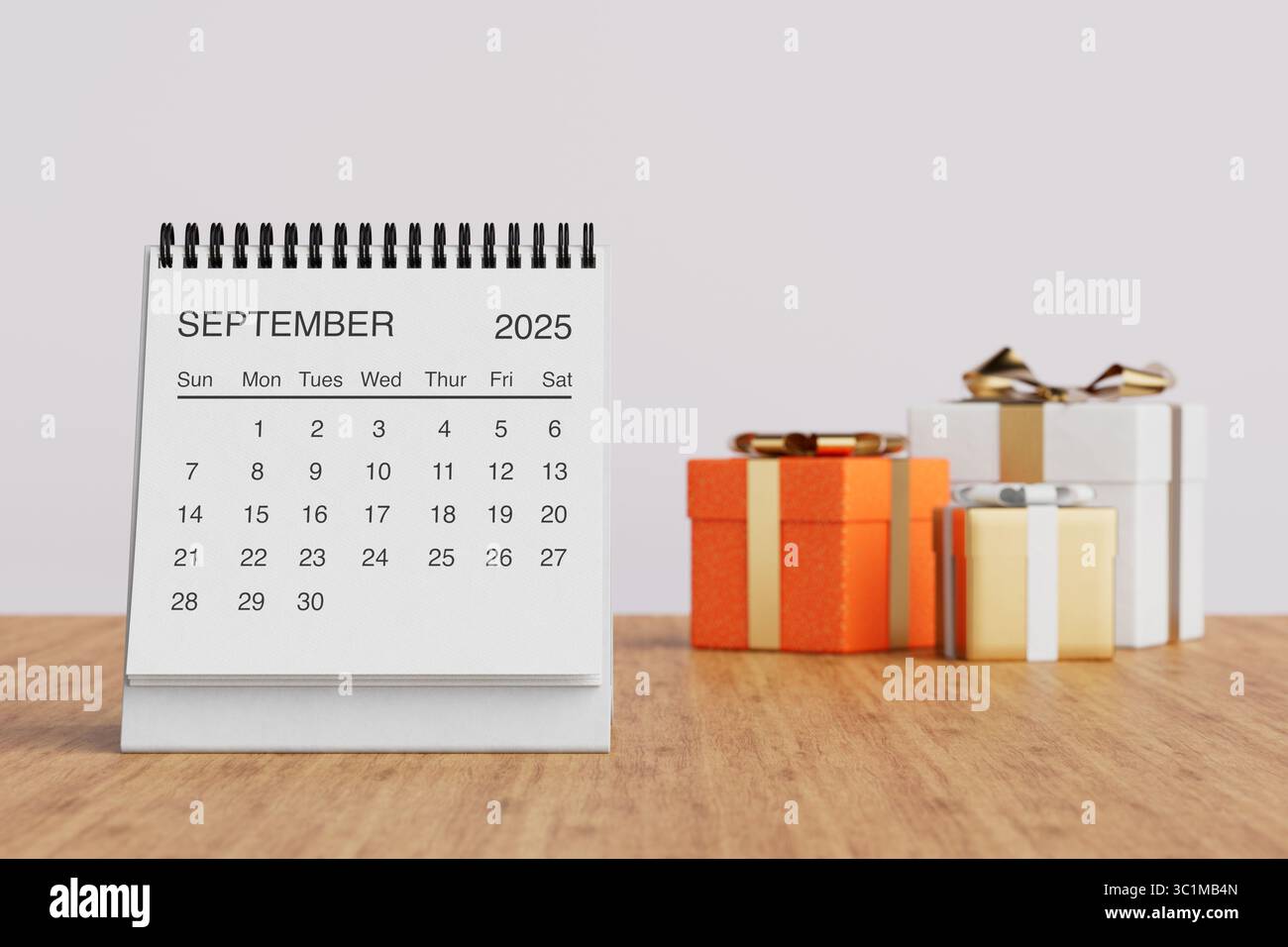 White Desk Monthly September 2025 Business Calendar Near Gift Boxes on a white background. 3d ...