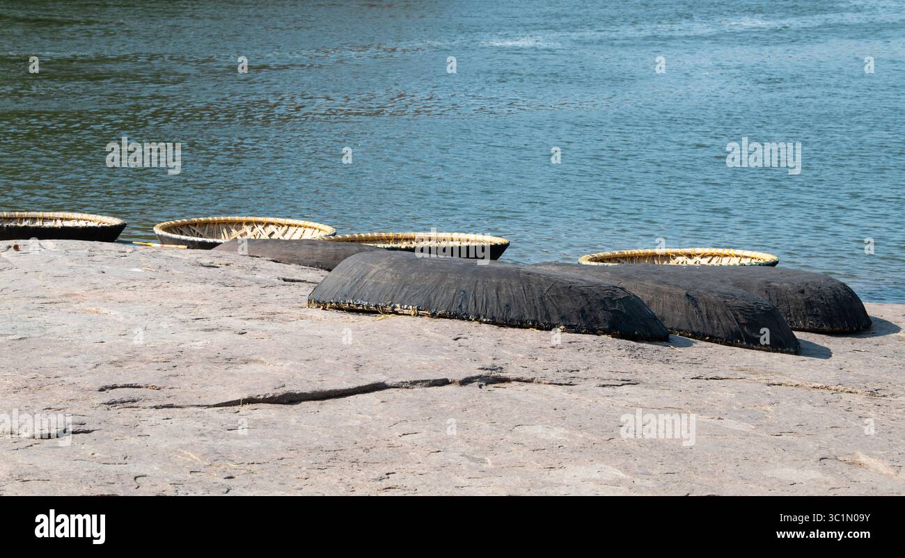 Coracle boats at the Tungabhadra River in Hampi, India, traditional ...