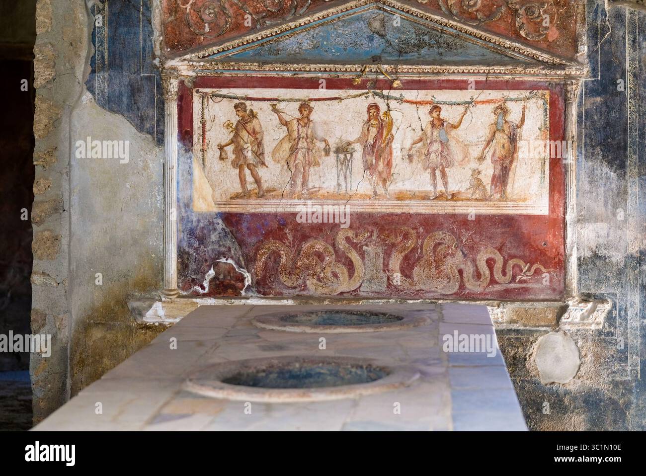 thermopolium in Pompeii with altar for the Lares who protect the house ...