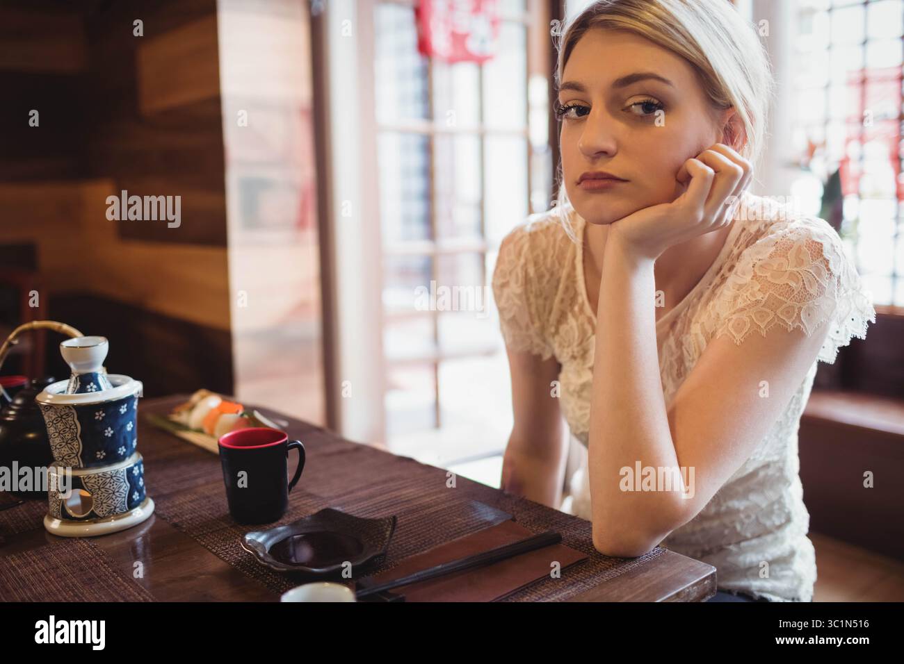 Resting head on table in restaurant hi-res stock photography and images ...