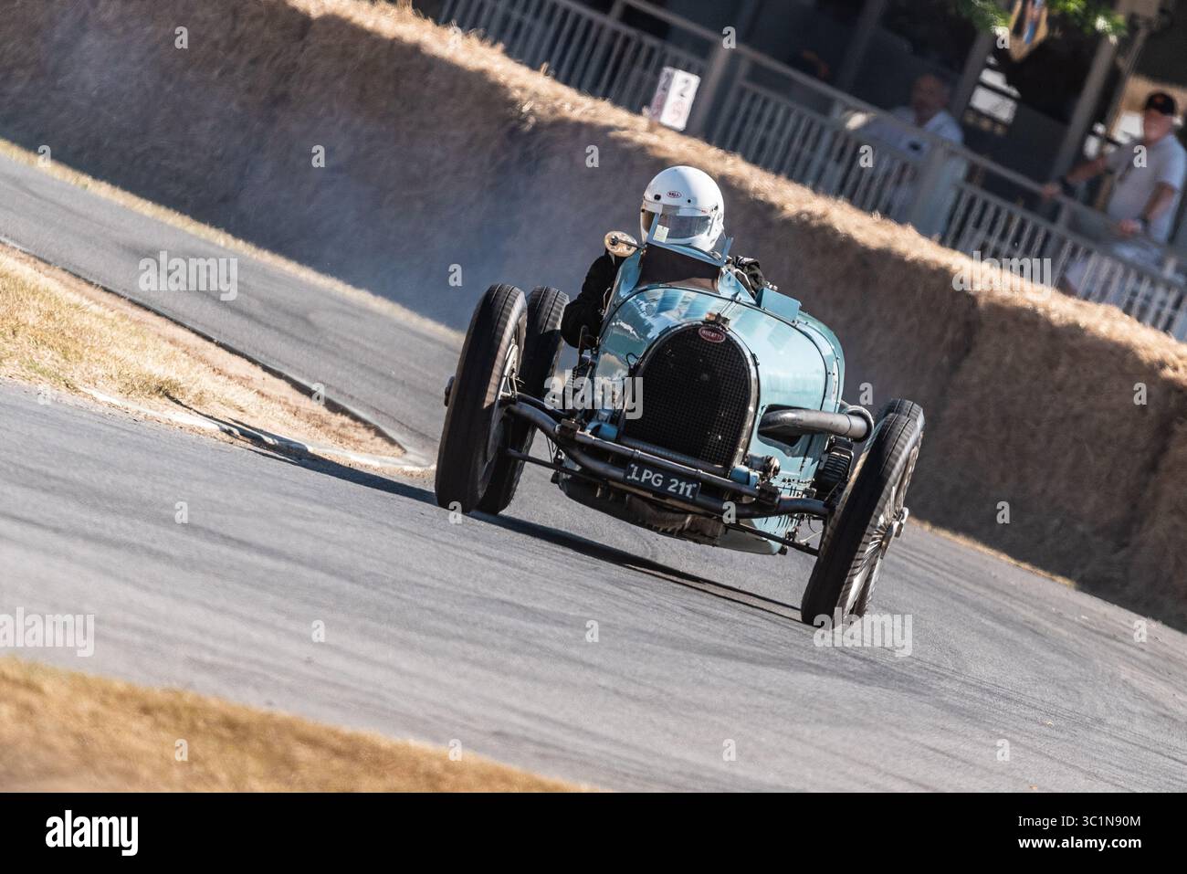 Bugatti Type 59 historic Formula 1 racing car driving up the hillclimb ...