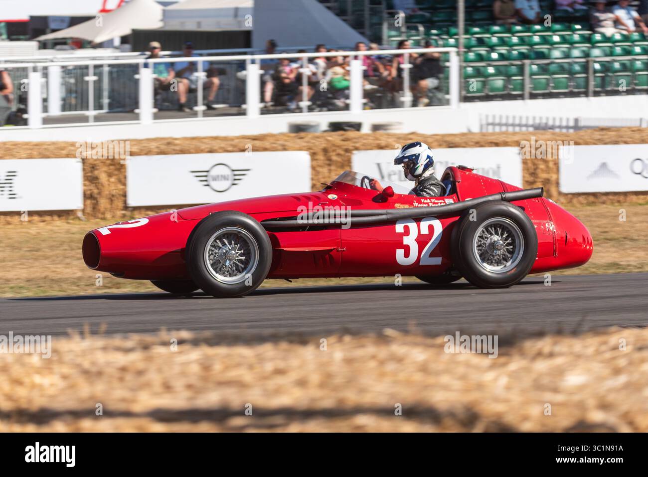 Maserati 250F historic Formula 1 racing car driving up the hillclimb at ...