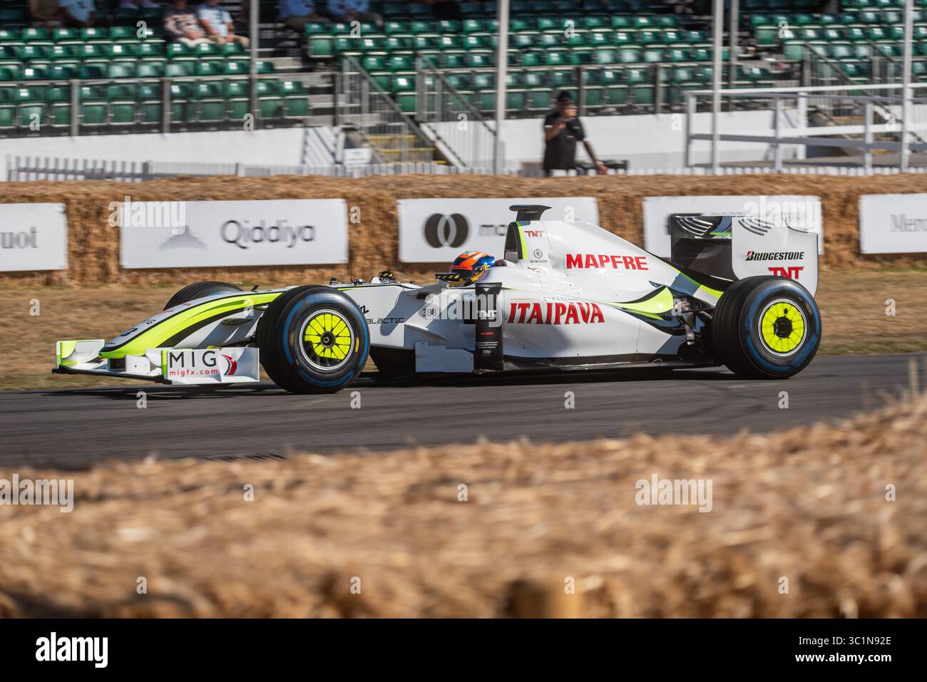 Brawn BGP 001 historic Formula 1 racing car driving up the hillclimb at ...