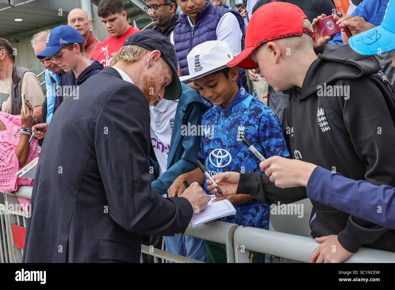 England captain Ben Stokes signs his autograph for fans during the 4th ...