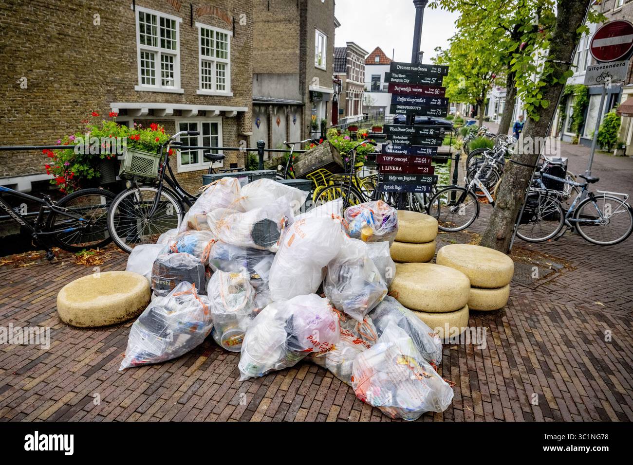 GOUDA - Garbage bags in a residential area with separated trash in ...