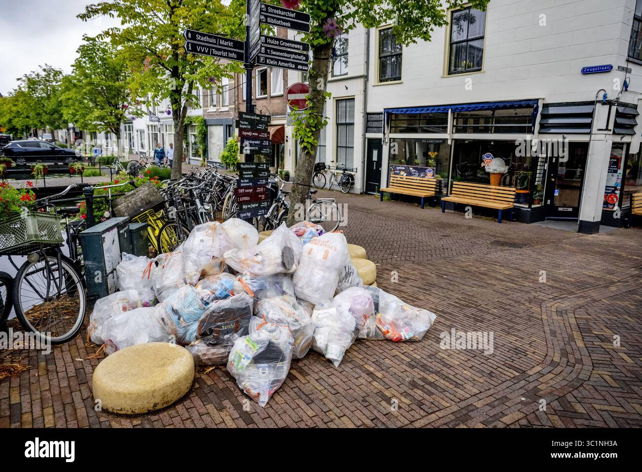 GOUDA - Garbage bags in a residential area with separated trash in ...