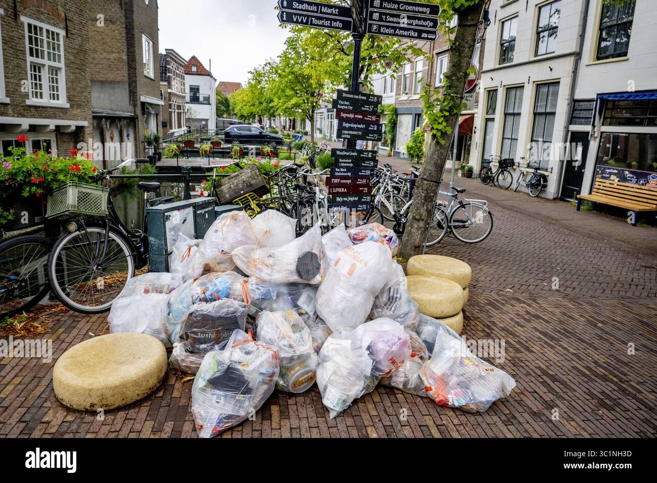 GOUDA - Garbage bags in a residential area with separated trash in ...