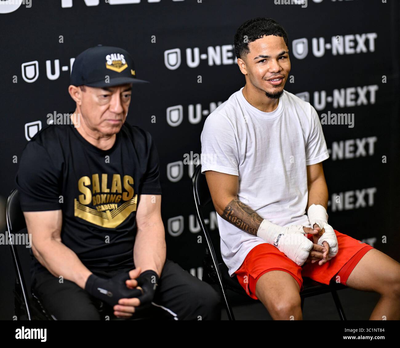 Erick Rosa of Dominican Republic and trainer Ismael Salas during a ...
