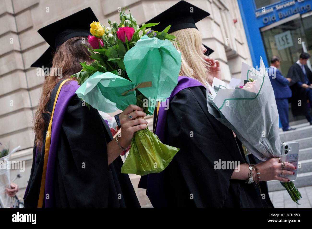 Women graduands celebrate their graduation from The London School of ...