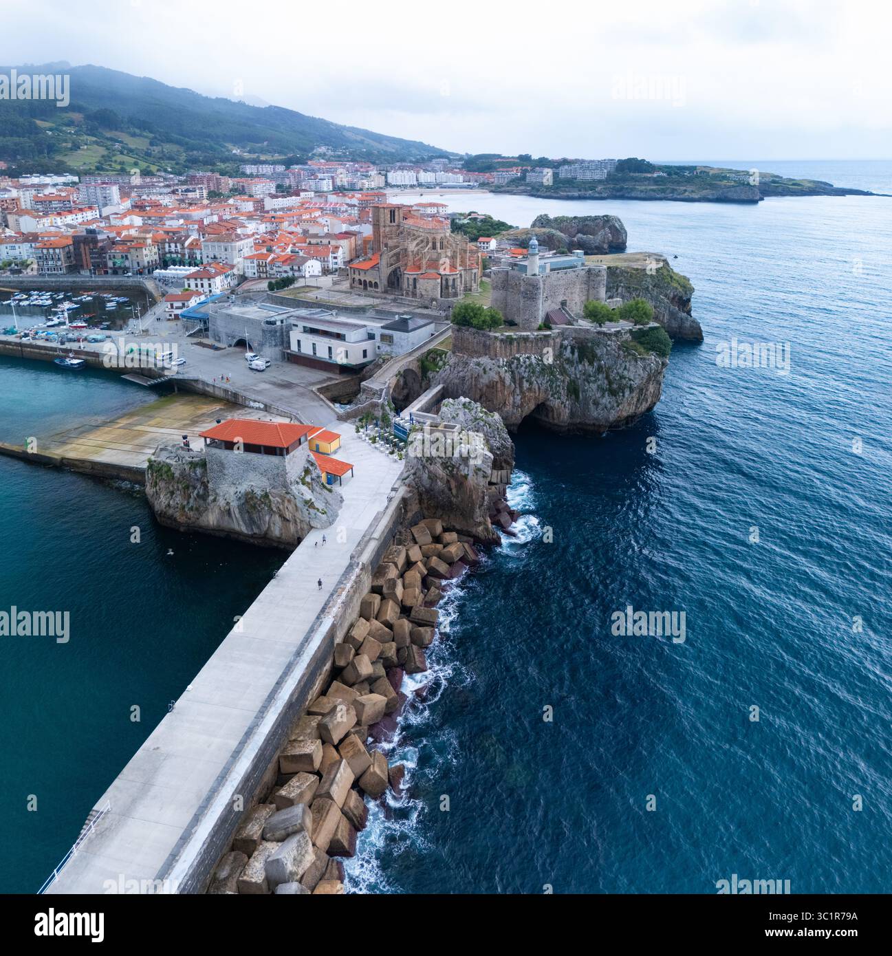 Aerial view from a drone of the Castro Urdiales port, the Church of ...