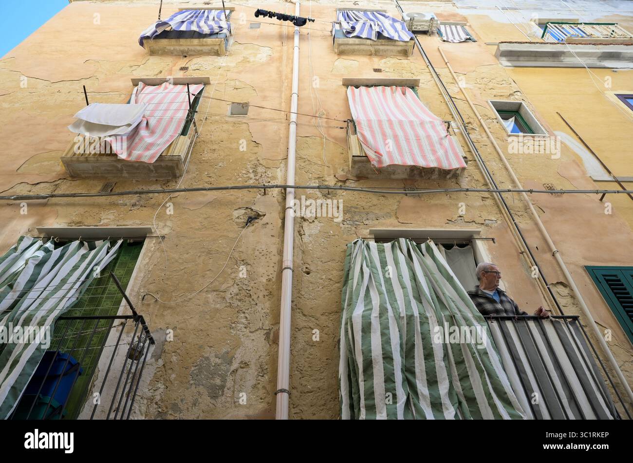 ITALY, Sicily, Trapani, old town, house with curtains closund the ...