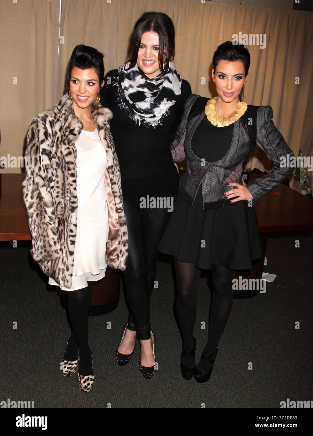 Kourtney Kardashian, Khloe Kardashian and Kim Kardashian at the ...