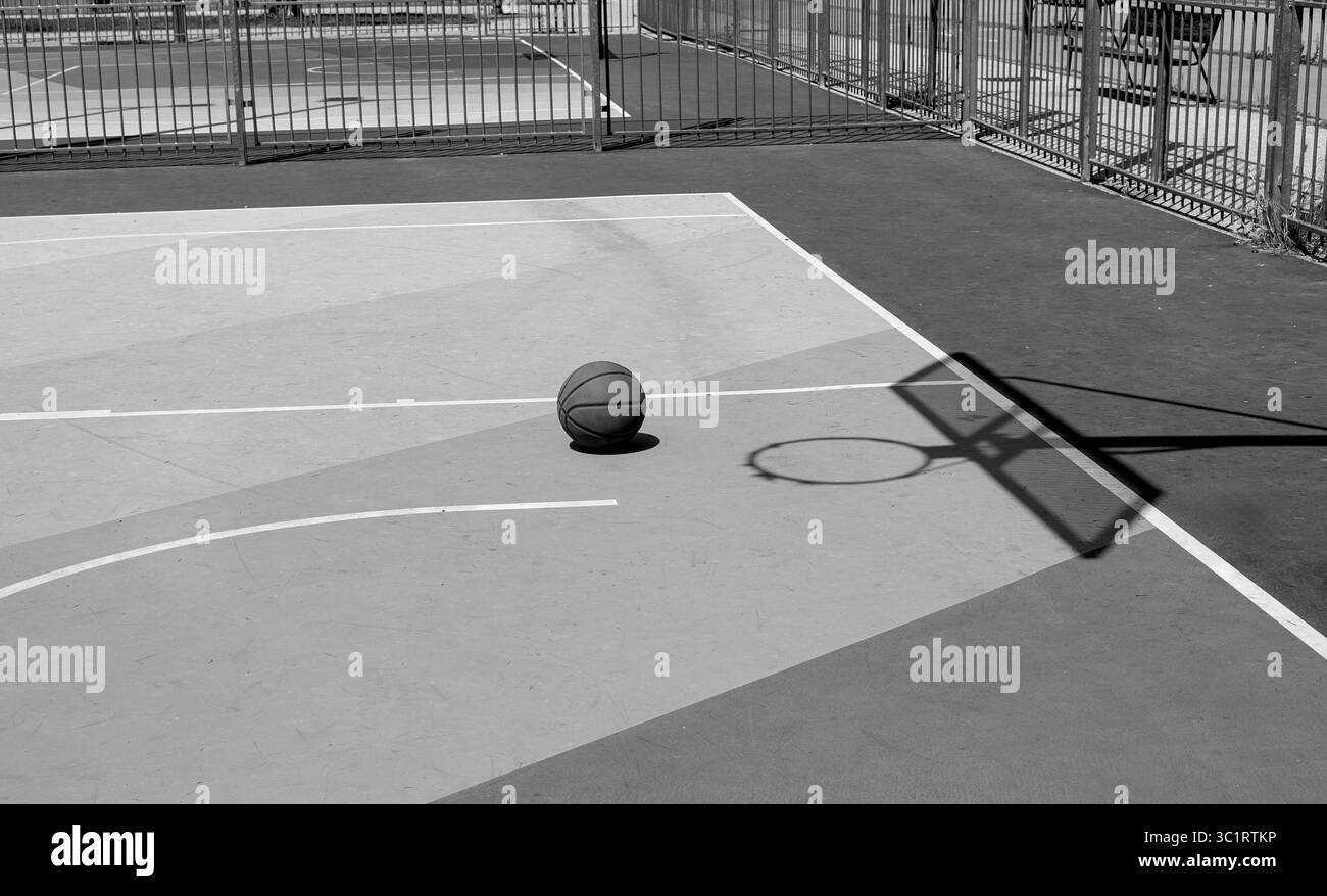 Basketball ball on ground Black and White Stock Photos & Images - Alamy