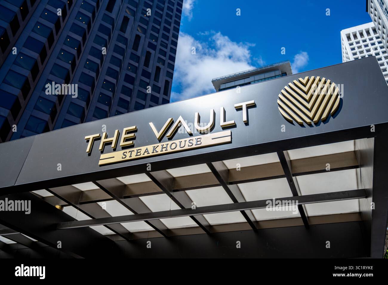 Entrance canopy with gold lettering for The Vault Steakhouse against ...