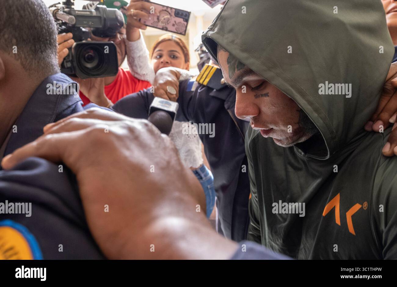 FILE - Rapper Daniel Hernandez, known as Tekashi 6ix9ine, is escorted ...