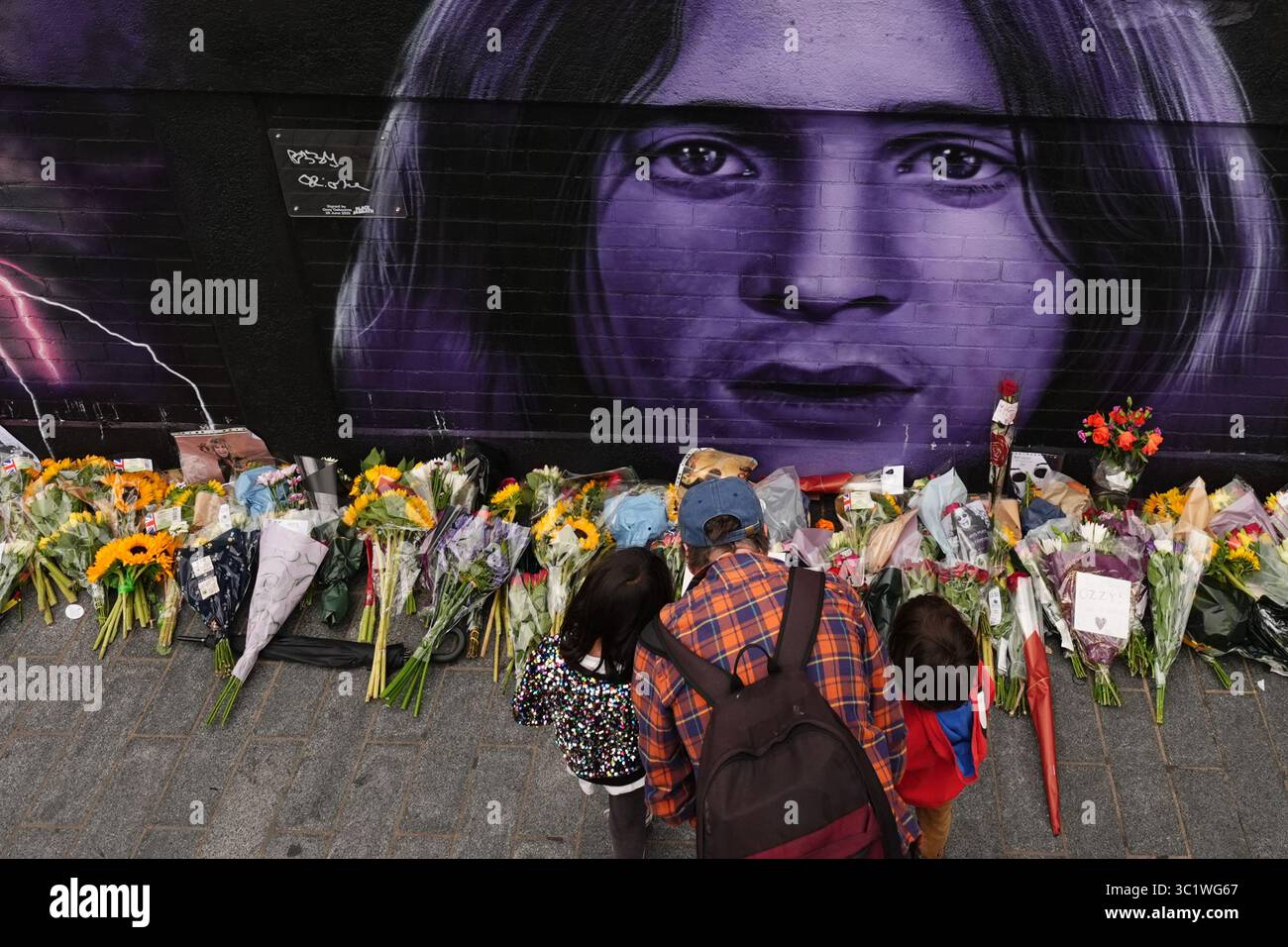 Floral tributes are left by the Sabbath Wall on Navigation Street in ...