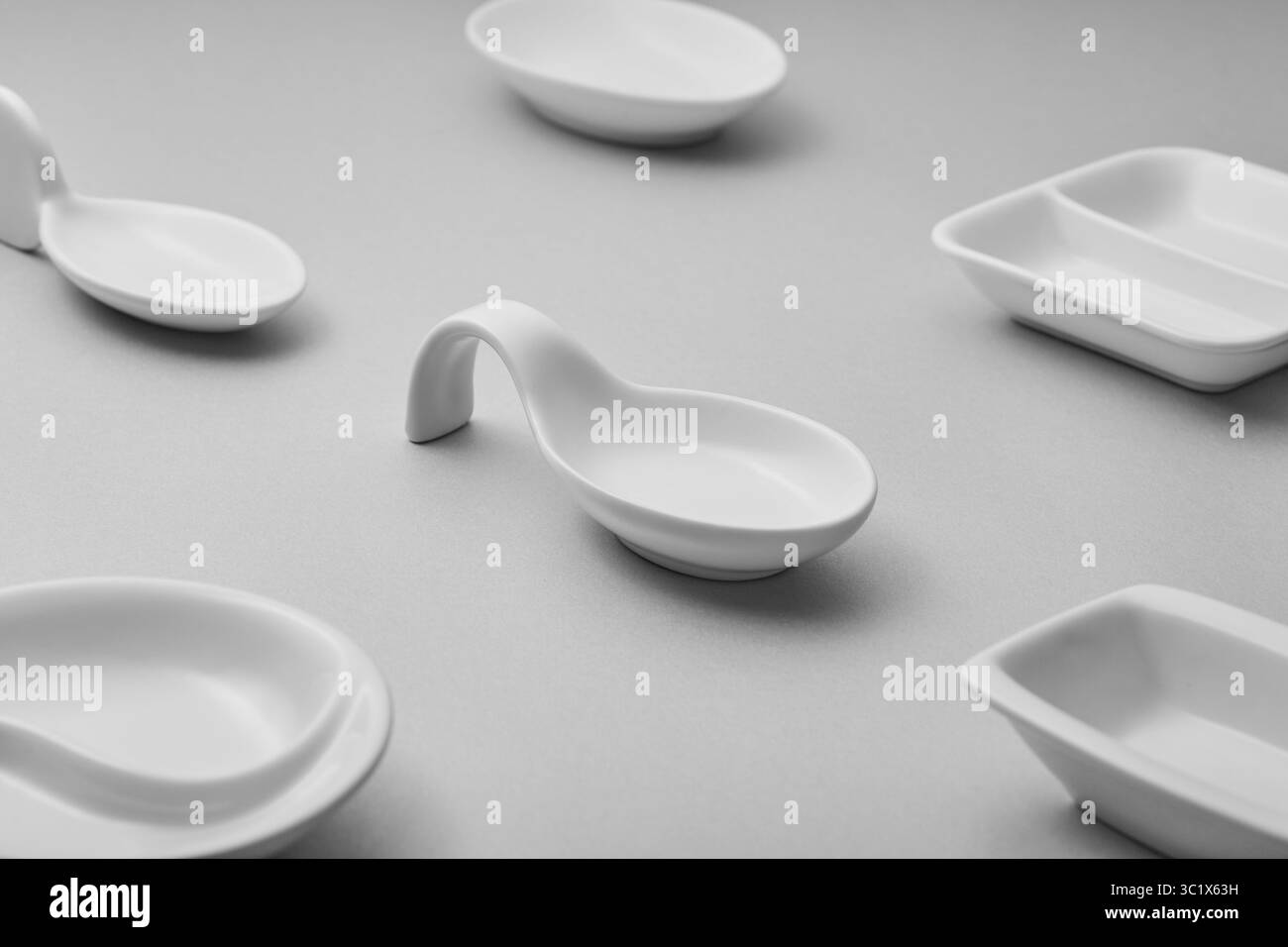 Spoon arrangement Black and White Stock Photos & Images - Alamy