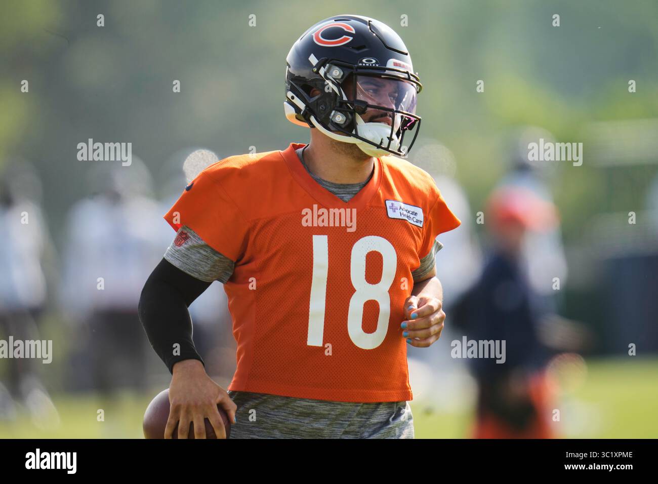 Chicago Bears quarterback Caleb Williams (18) works out during practice ...