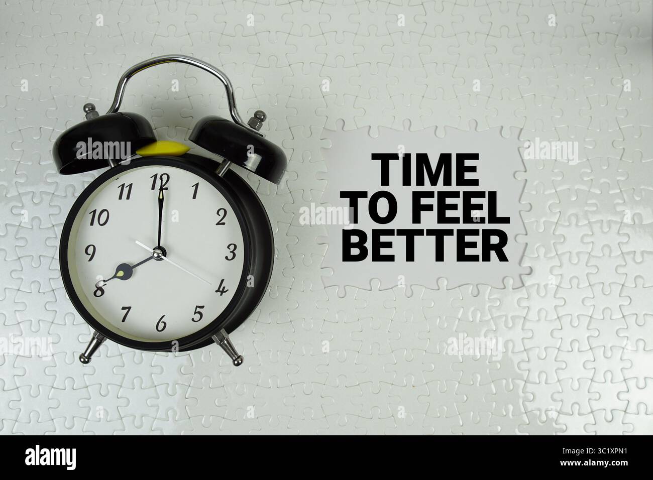 Time To Feel Better text with alarm clock on white background Stock ...