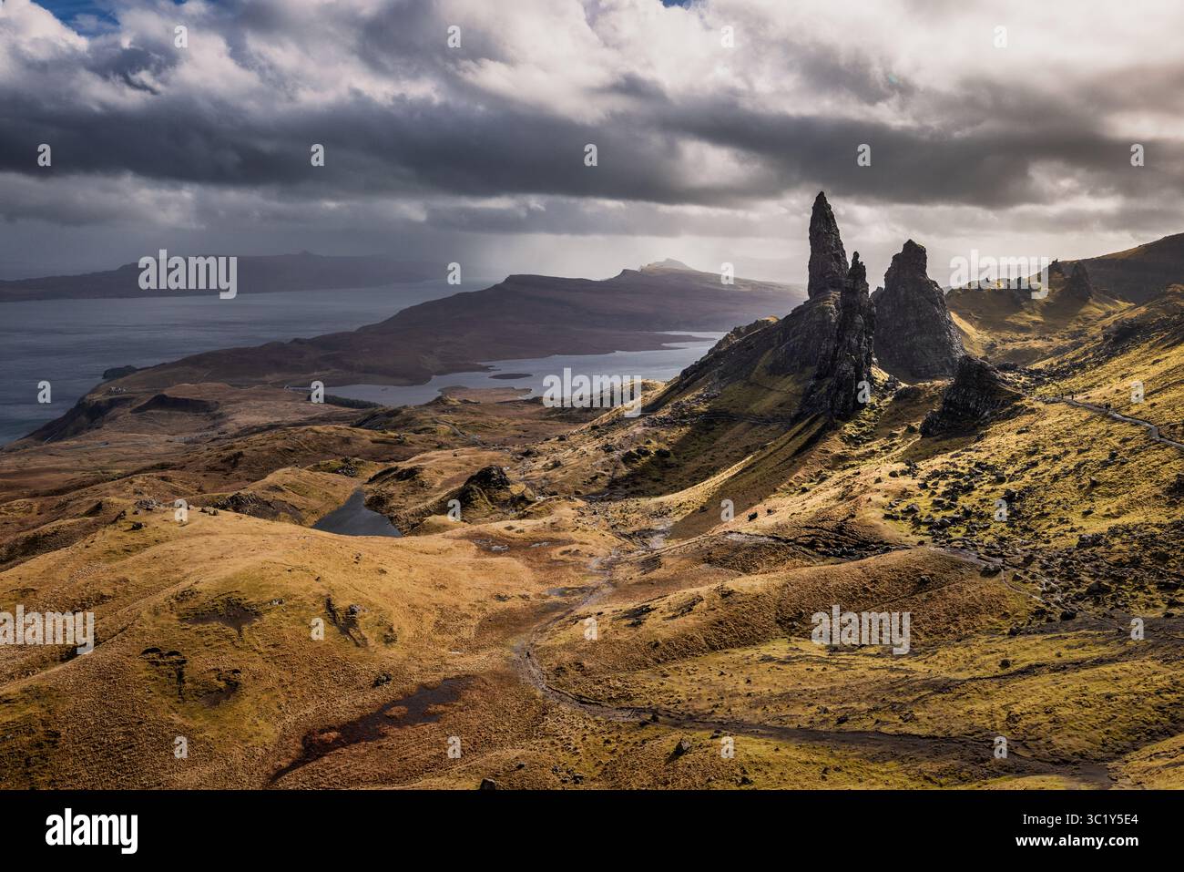 Aerial view of the rugged, towering Old Man of Storr piercing through ...