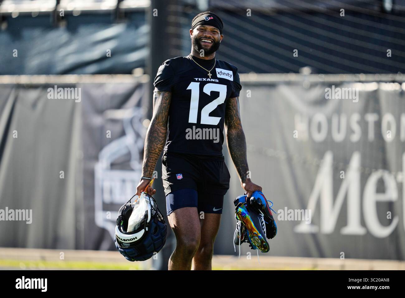 Houston Texans wide receiver Nico Collins smiles as he arrives for the ...